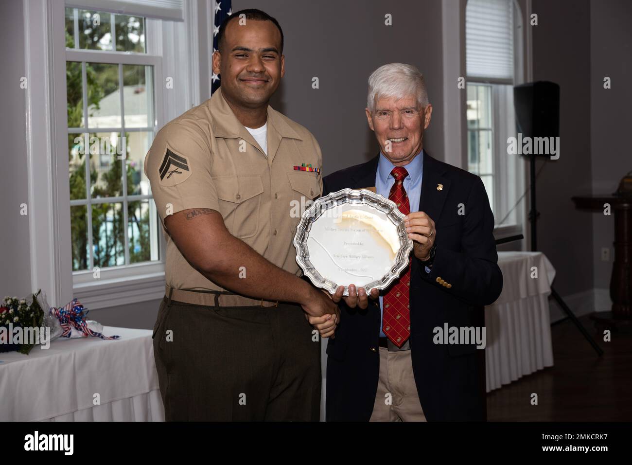 U.S. Marine Corps Cpl. Austin Crooks (left), an administrative ...