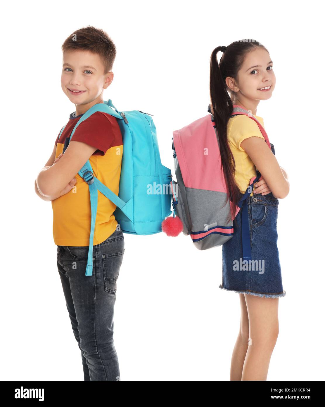 Little school children with backpacks on white background Stock Photo ...