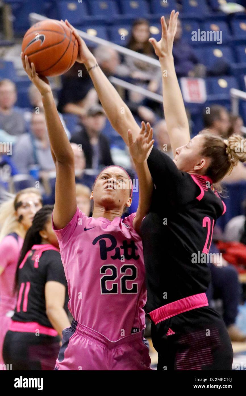 Louisville's Kylee Shook, right, blocks a shot by Pittsburgh's Jaala ...