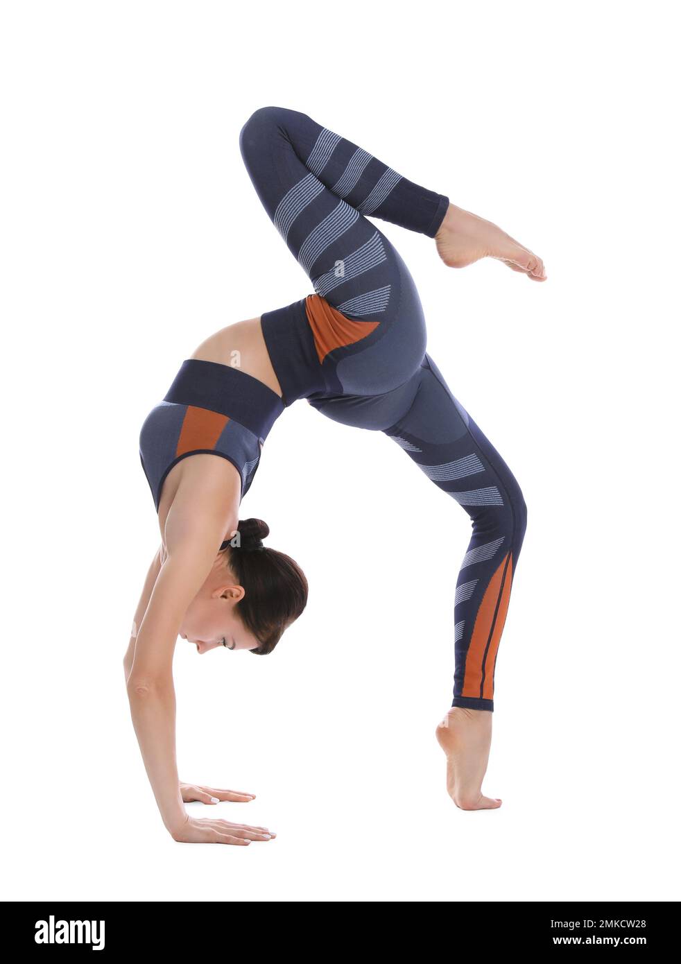 Professional young acrobat exercising on white background Stock Photo ...