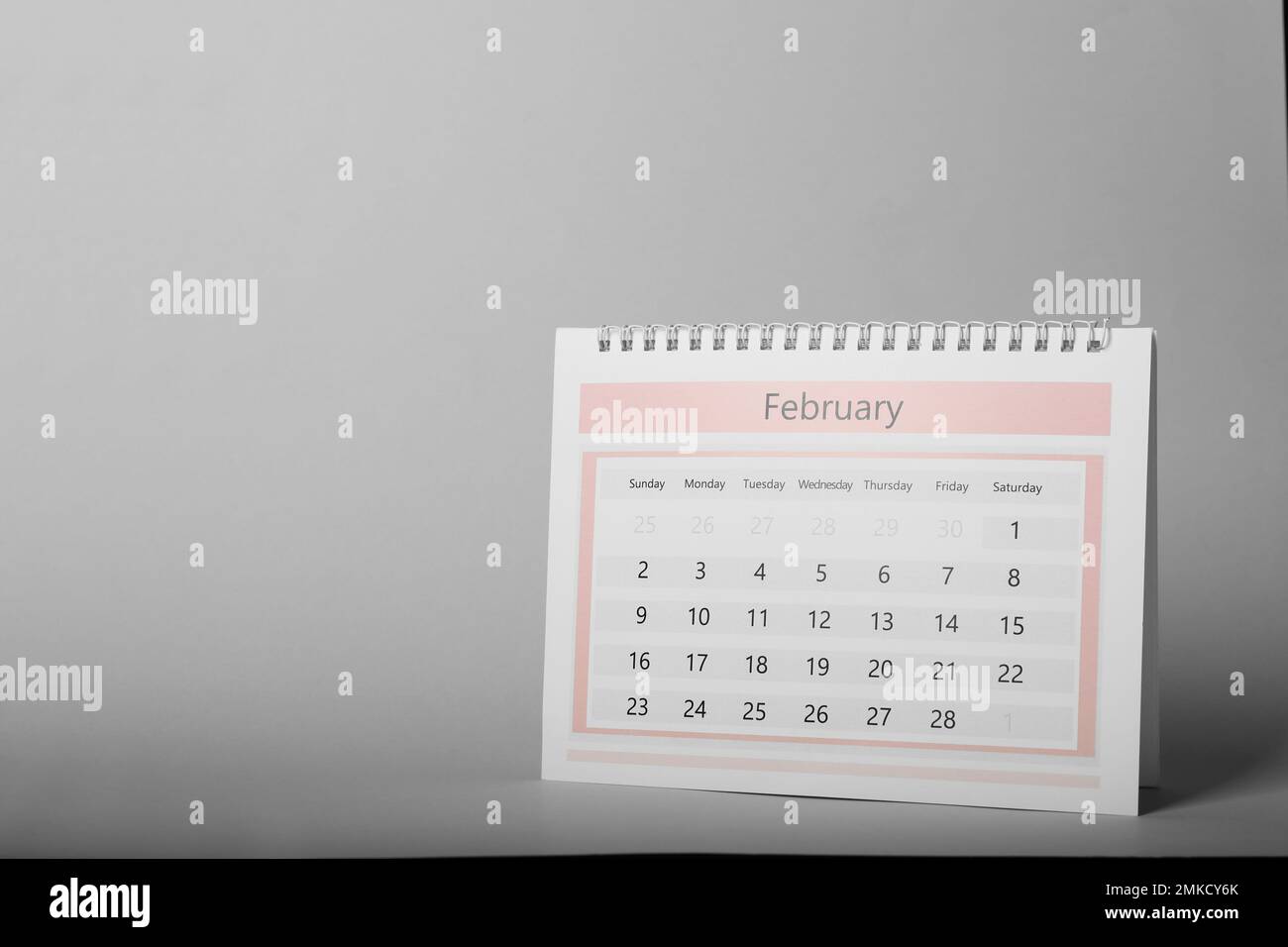 Paper calendar on grey background, space for text. Planning concept ...