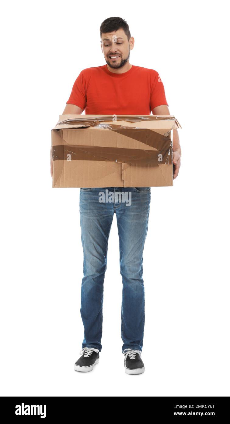 Emotional courier with damaged cardboard box on white background. Poor ...