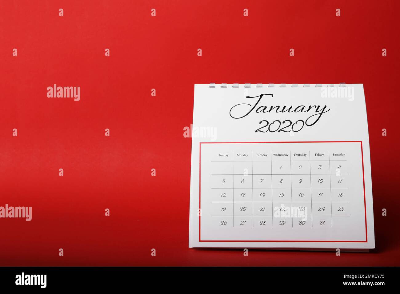Paper calendar on red background. Planning concept Stock Photo - Alamy