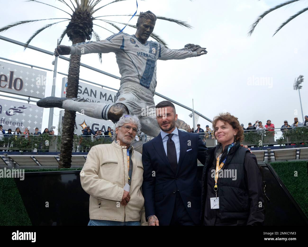 Sculptor Omri Amrany, left, David Beckham, center, and Julie Rotblatt ...