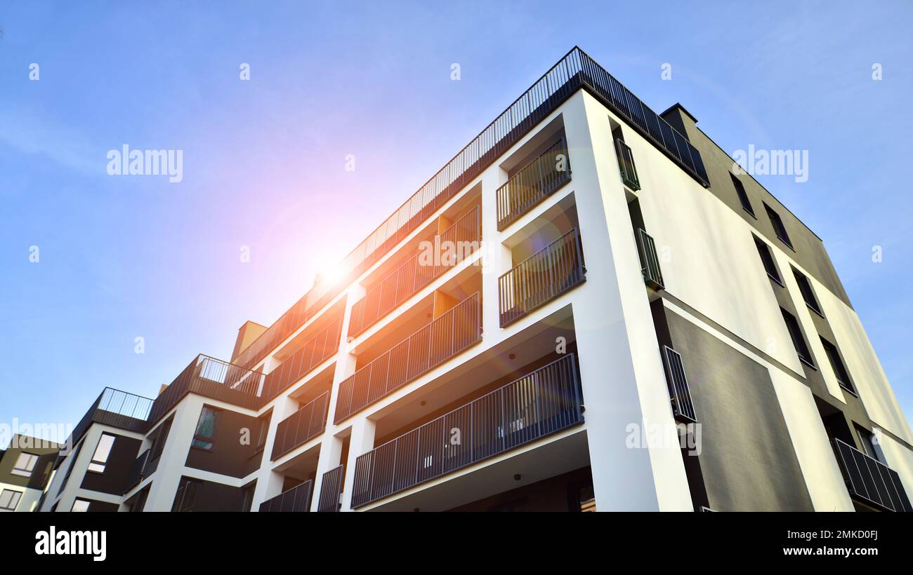 Condominium and apartment building with symmetrical modern architecture ...