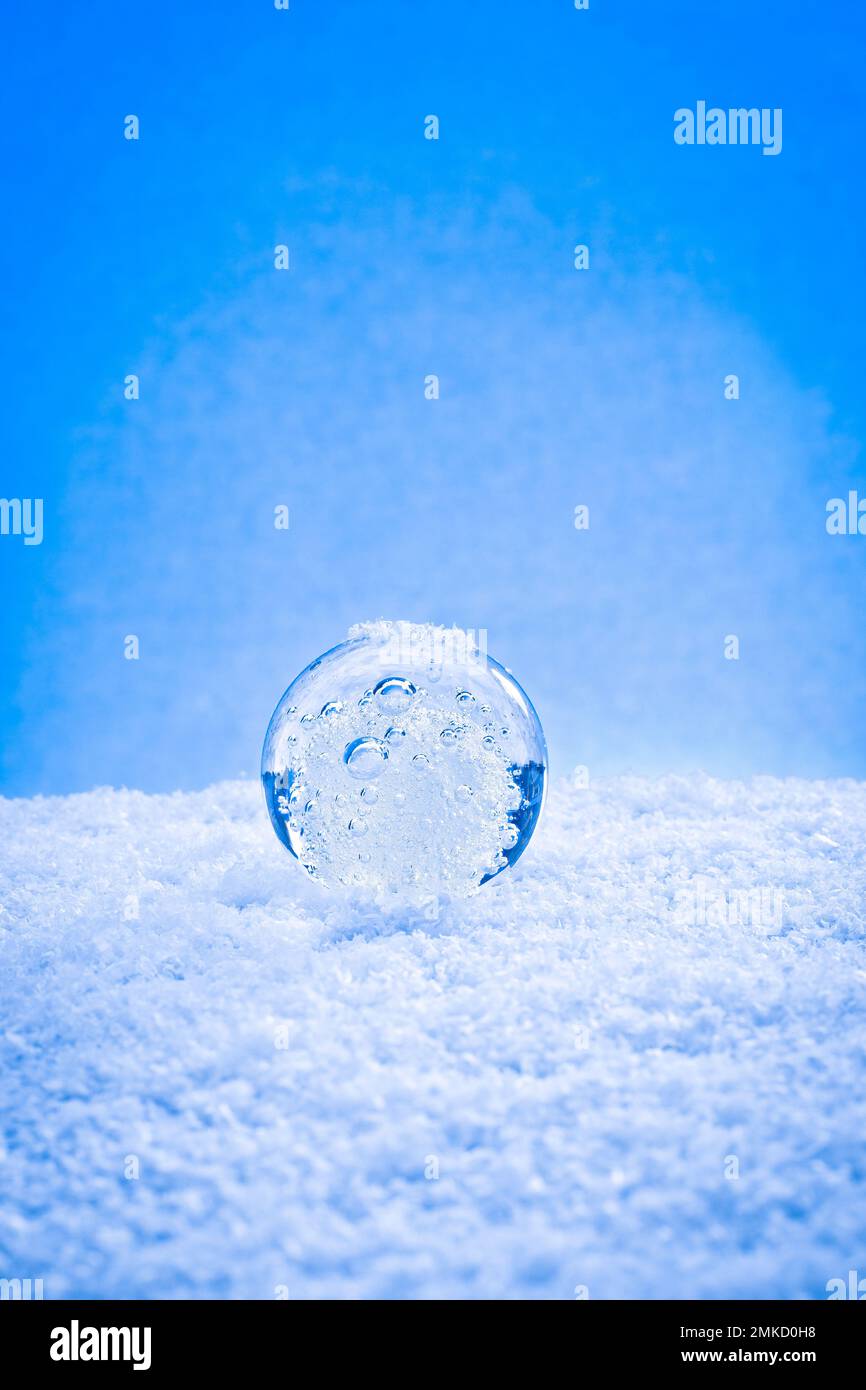 Cold crystal ball above the snow Stock Photo - Alamy