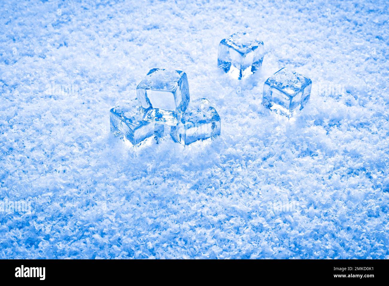 Cold ice cubes on the snow Stock Photo - Alamy