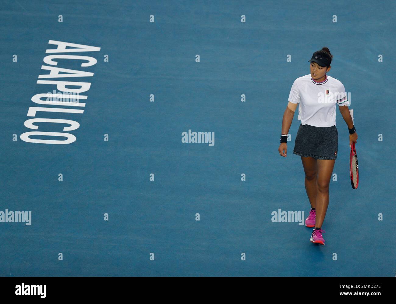 China's Yafan Wang walks on the court during her Mexican Tennis Open ...