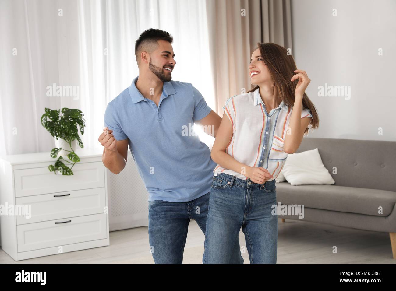 Attractive couple dancing passionate hi-res stock photography and ...