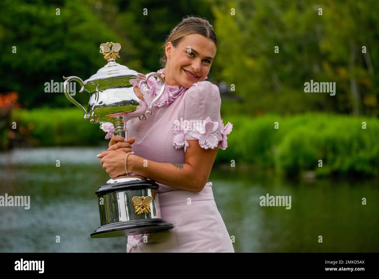 Aryna Sabalenka of Belarus poses with the Daphne Akhurst Memorial Trophy in the Royal Botanical ...