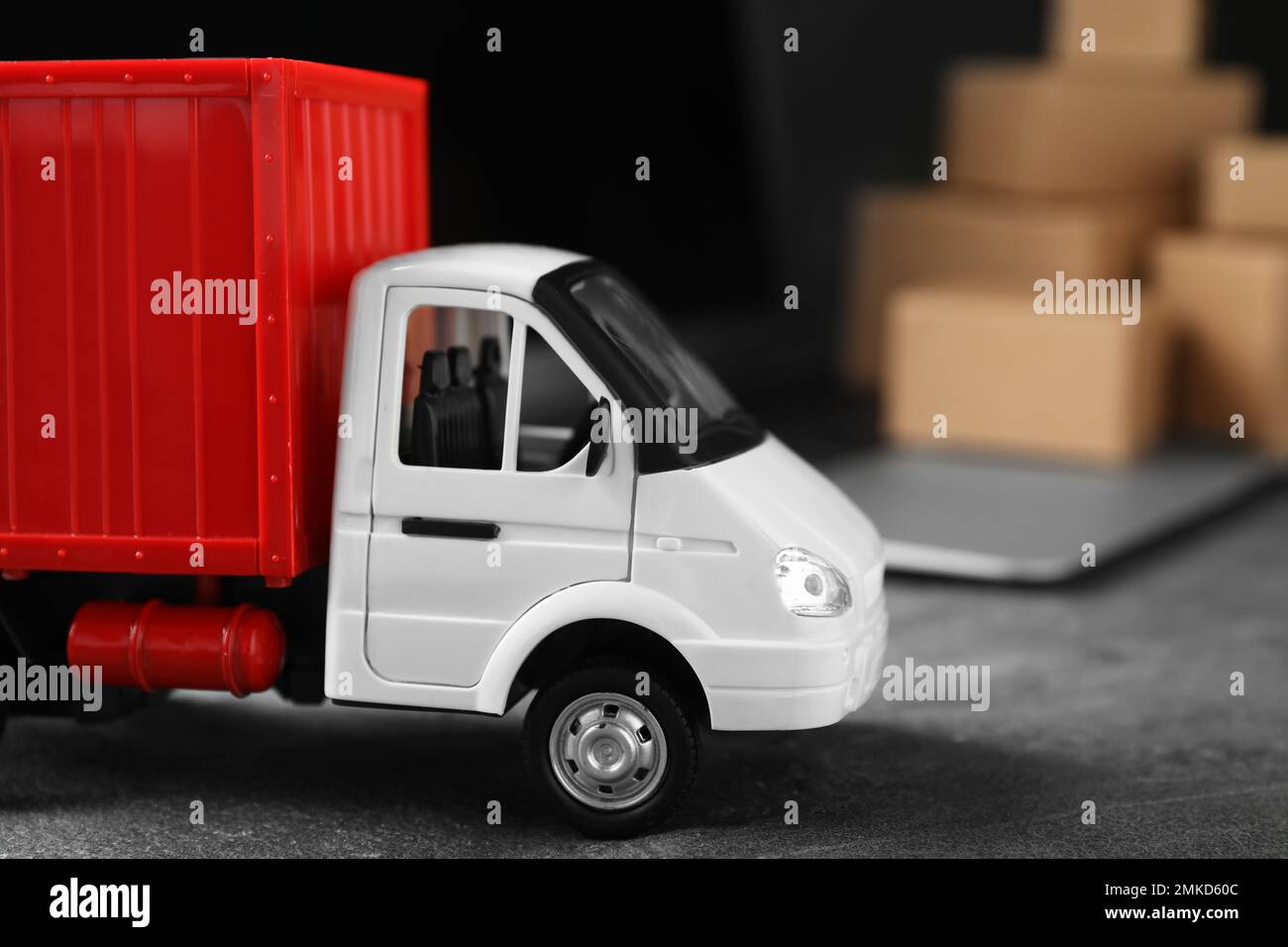 Toy truck on table. Logistics and wholesale concept Stock Photo - Alamy