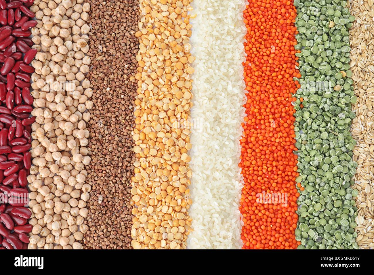 Different types of legumes and cereals as background, top view. Organic ...