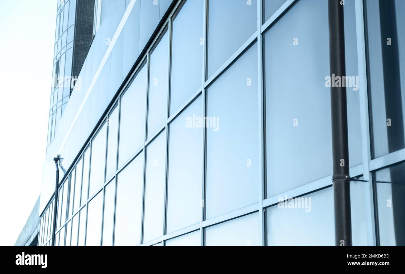 Modern building with tinted windows. Urban architecture Stock Photo - Alamy
