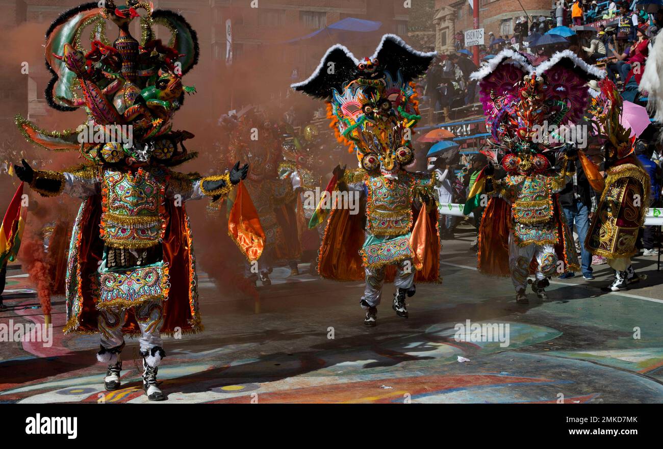 Dancers perform the traditional "Diablada" or Dance of the Devils ...
