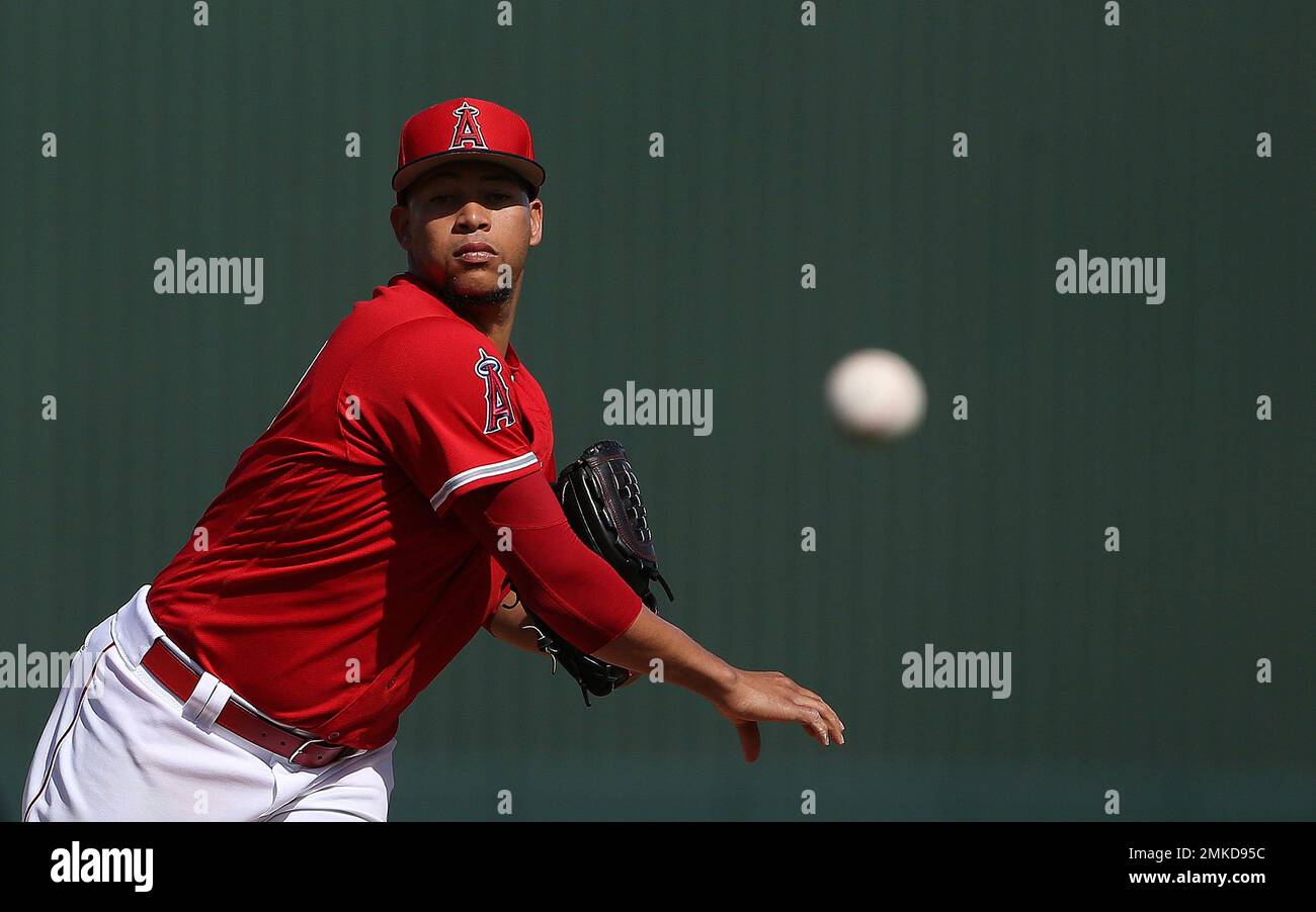 Los Angeles Angels' Hansel Robles warms up during the third inning of a ...