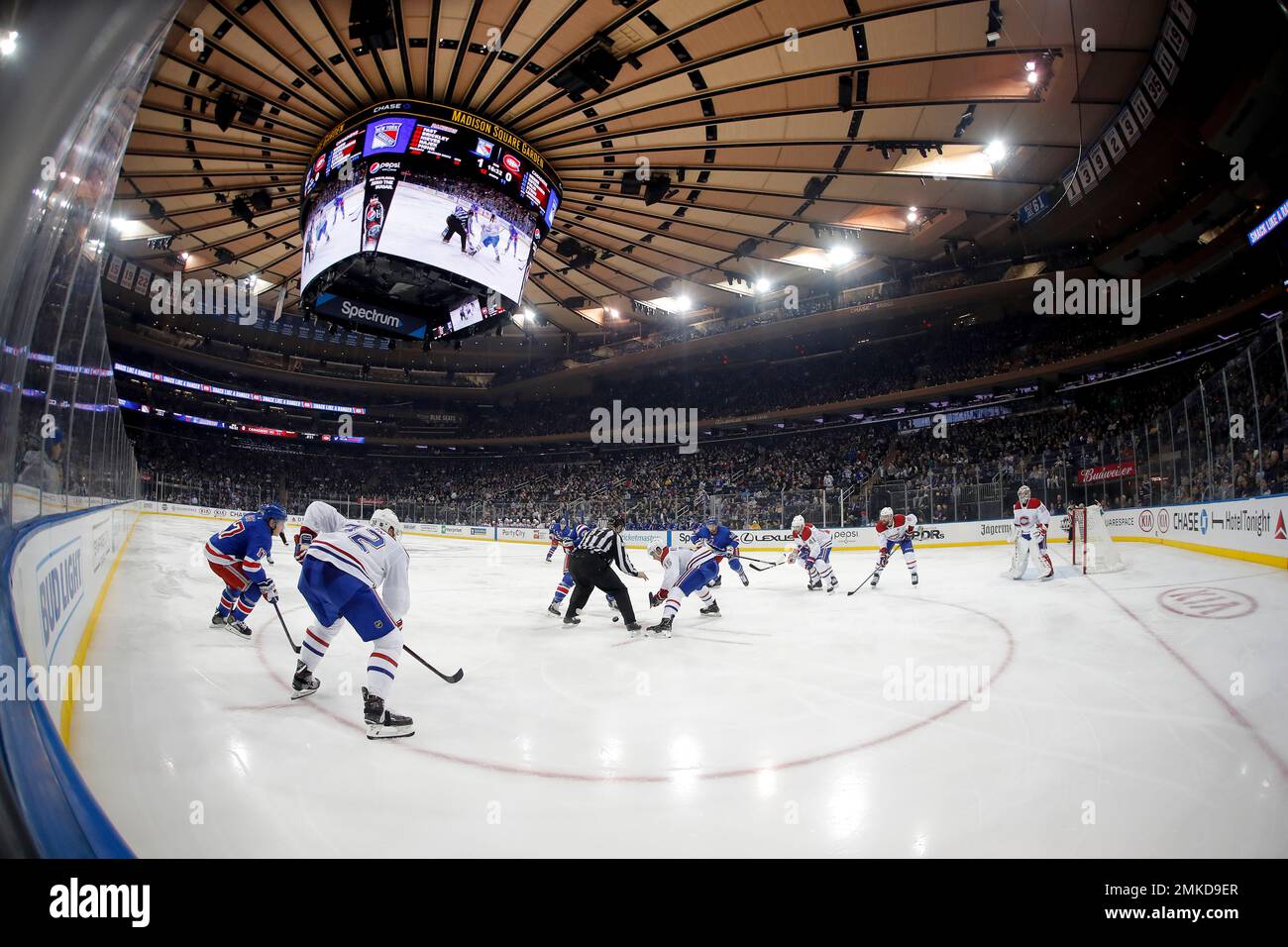 The New York Rangers and the Montreal Canadiens face off during the ...