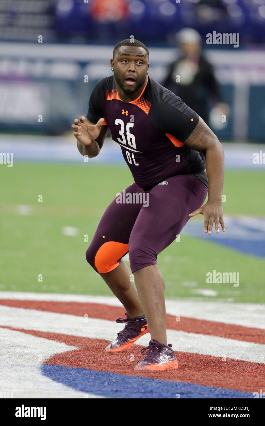 Mississippi offensive lineman Greg Little runs a drill during the NFL ...
