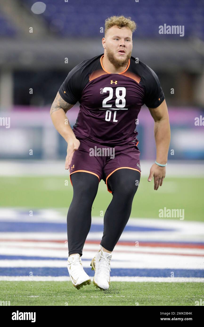 UCLA offensive lineman Andre James runs a drill during the NFL football ...