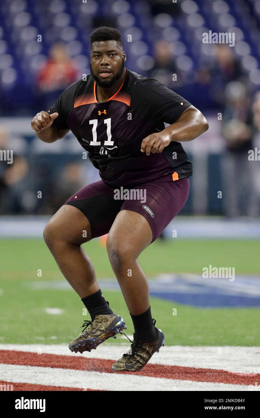 Charlotte offensive lineman Nate Davis runs a drill during the NFL ...