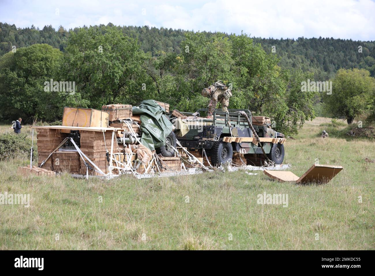 A U.S. Army Soldier assigned to the 173rd Airborne Brigade unpackages a ...