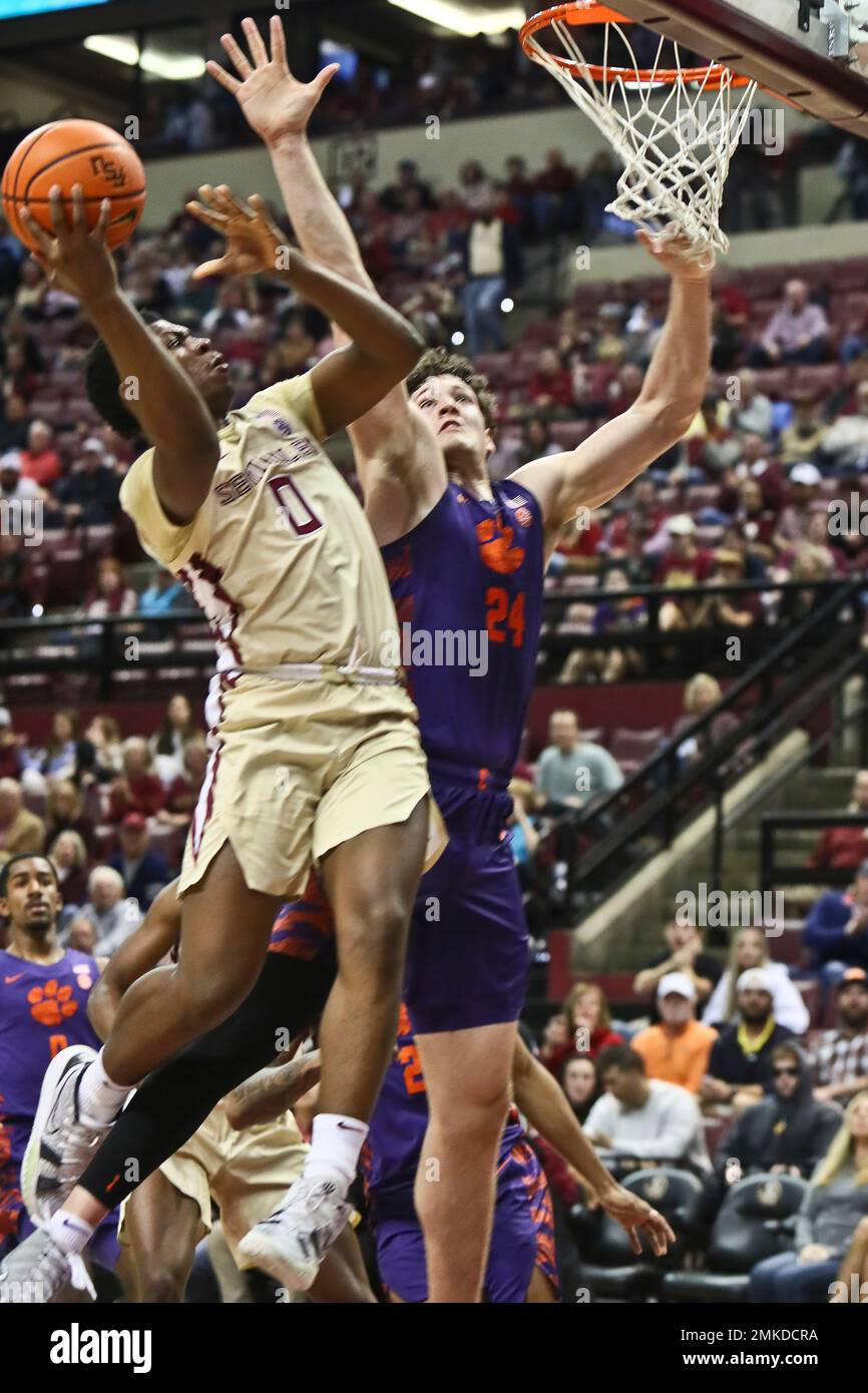 Florida State guard Chandler Jackson (0) makes a layup after a steal as ...