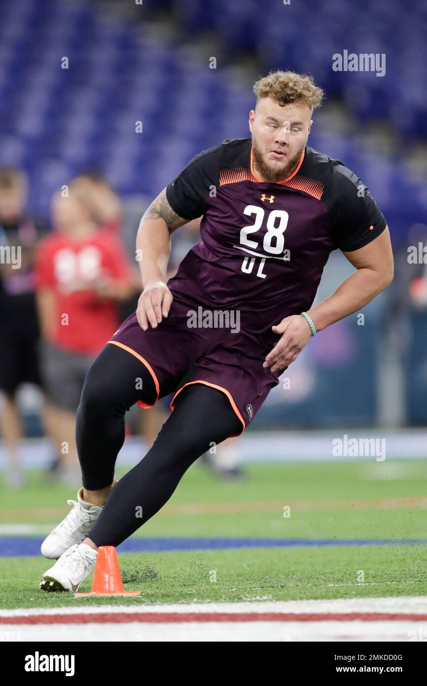 UCLA offensive lineman Andre James runs a drill at the NFL football ...