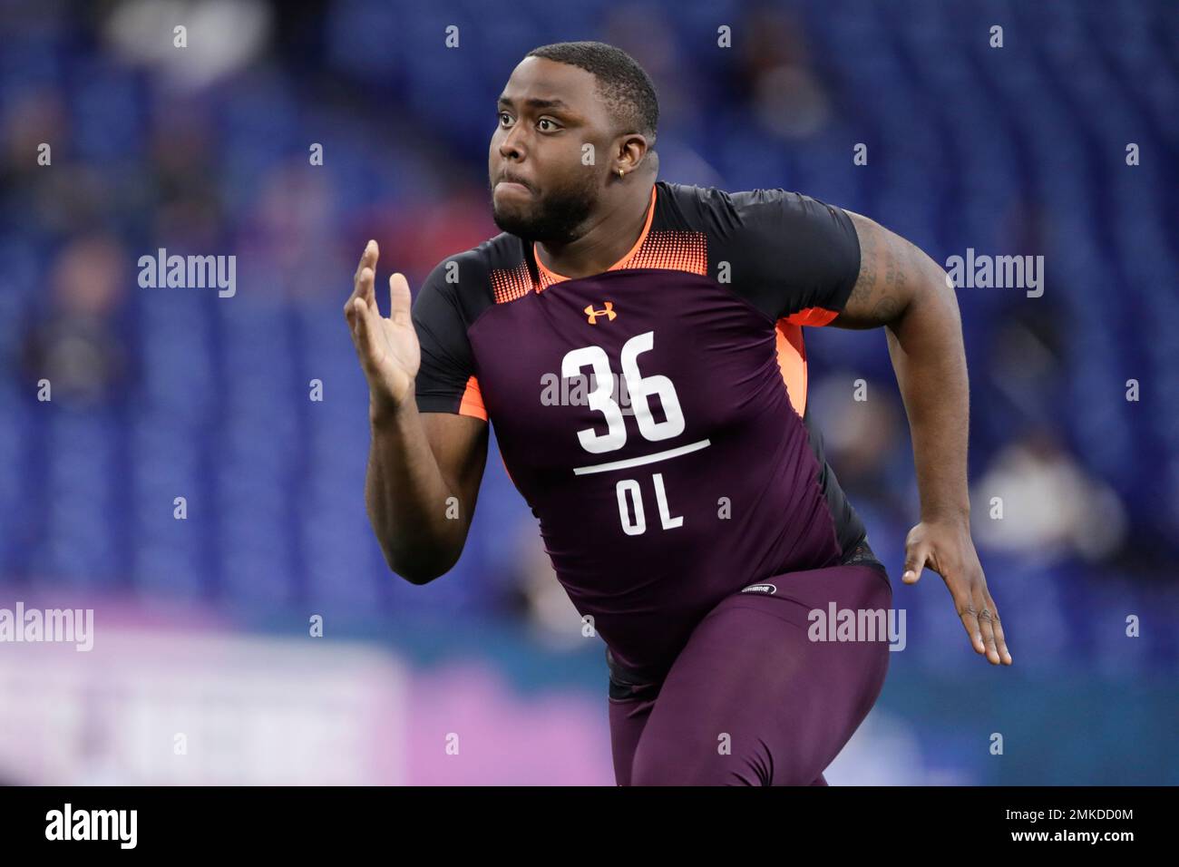 Mississippi offensive lineman Greg Little runs a drill at the NFL football scouting combine in ...