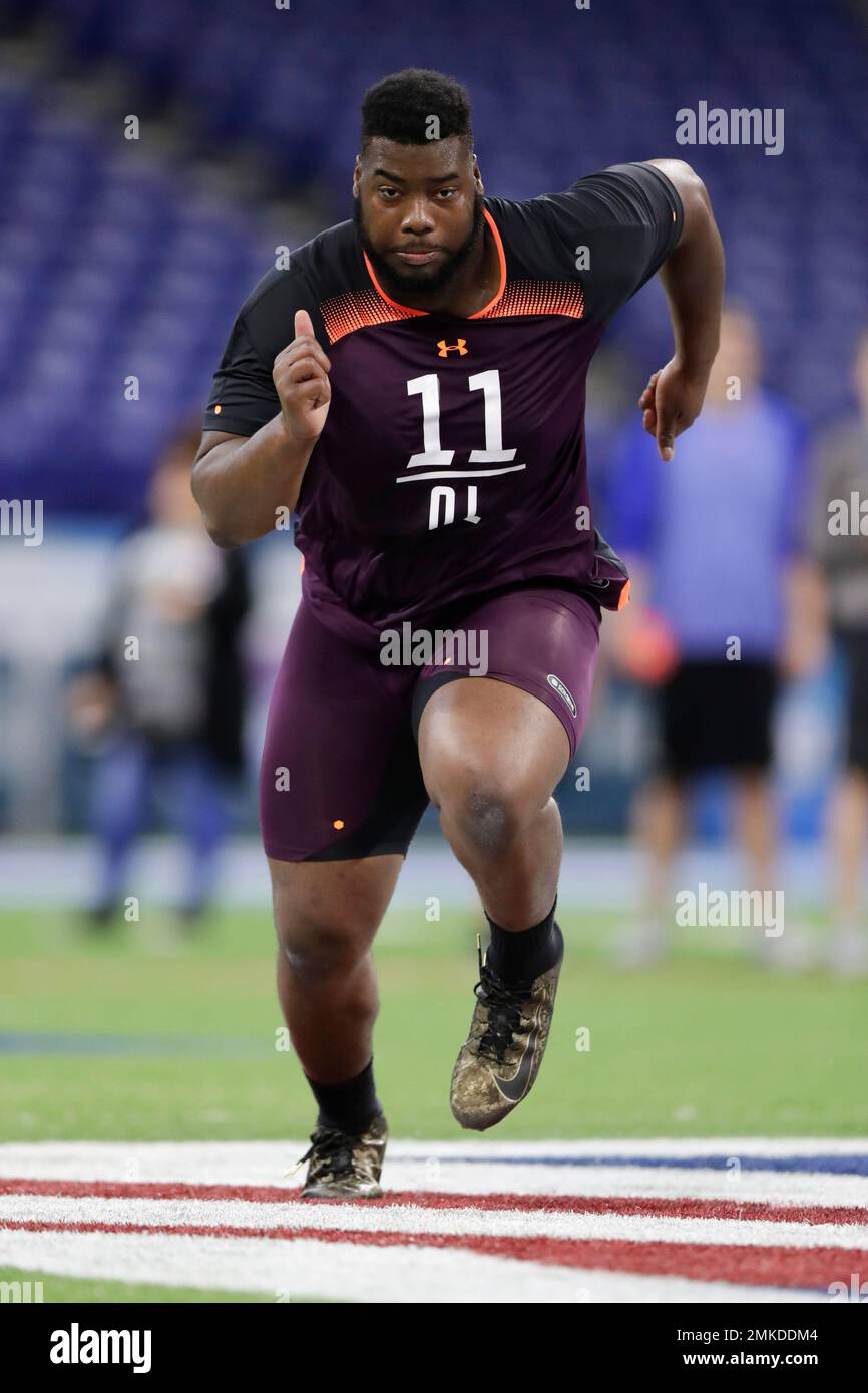 Charlotte offensive lineman Nate Davis runs a drill at the NFL football ...