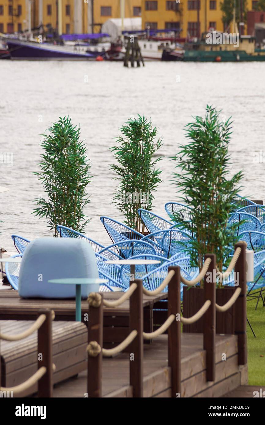 outdoor seating on a pier during the summer Stock Photo - Alamy