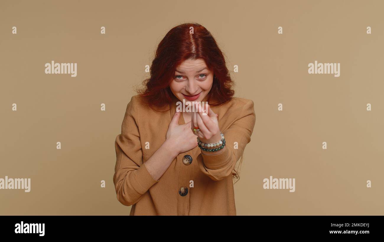 Give me money, please. Woman rubbing fingers show cash gesture, demands ...