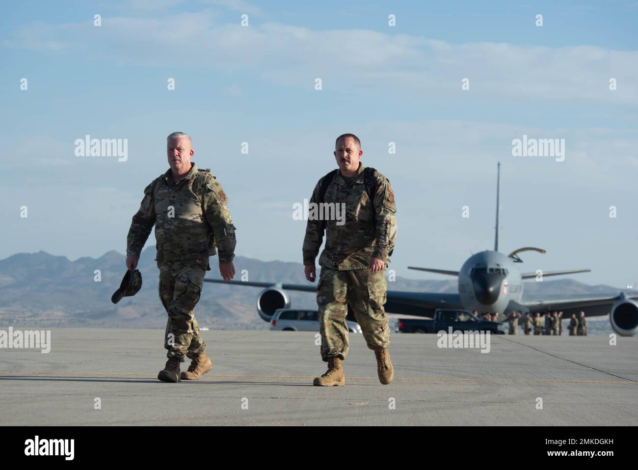 Col. Gene Buckner and SMSgt. Andrew McDonald walk off a KC-135R ...