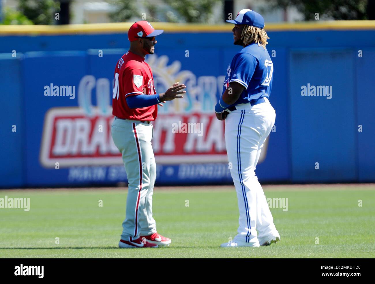 Philadelphia Phillies' Gregorio Petit, left, talks with Toronto Blue ...