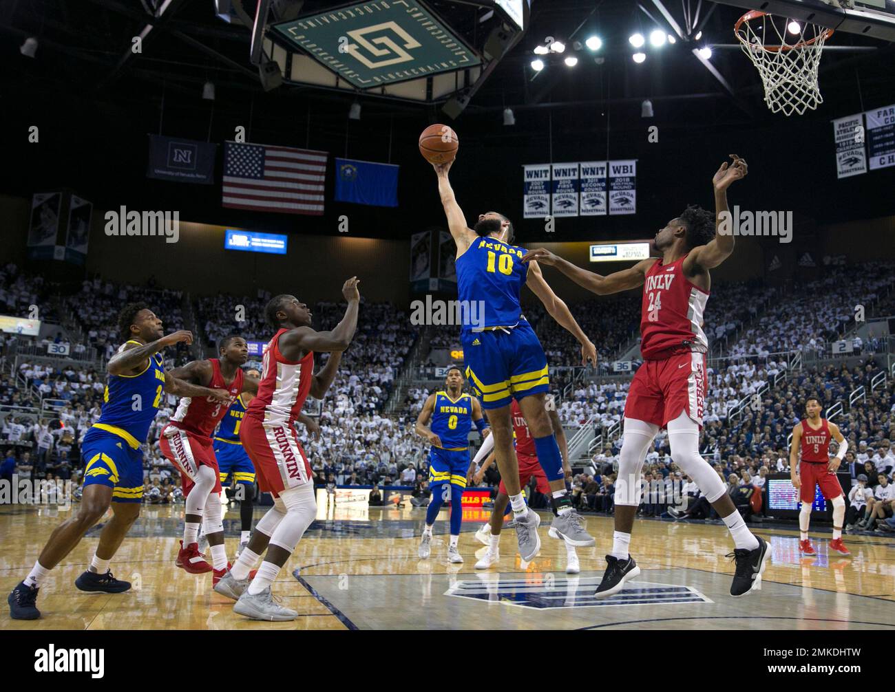 Nevada forward Caleb Martin (10) grabs a rebound against UNLV in the ...