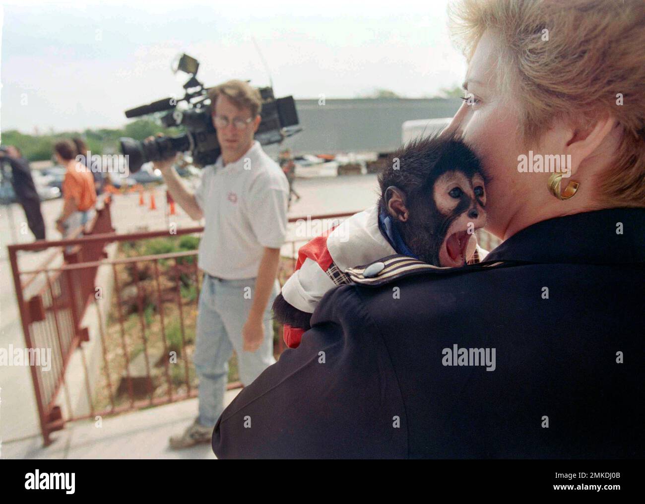 Sharlotte Campbell, right, holds Charlie, a spider monkey, in Oklahoma ...