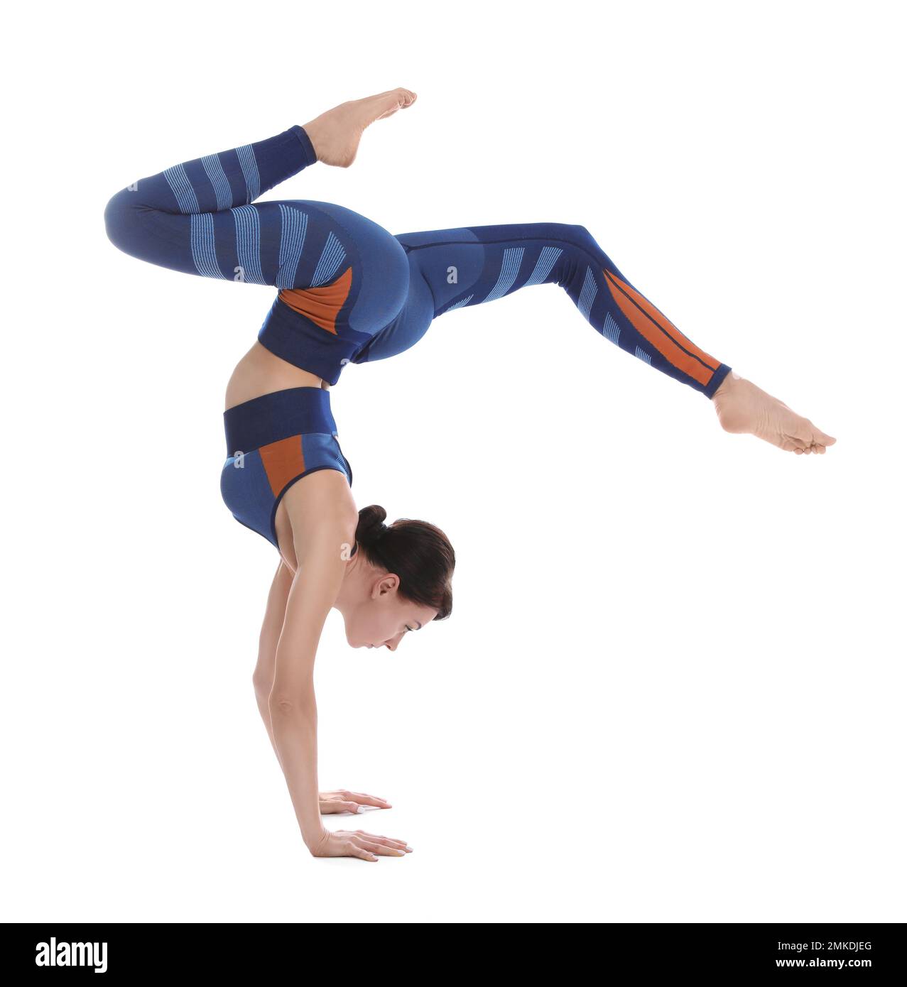 Professional young acrobat exercising on white background Stock Photo ...