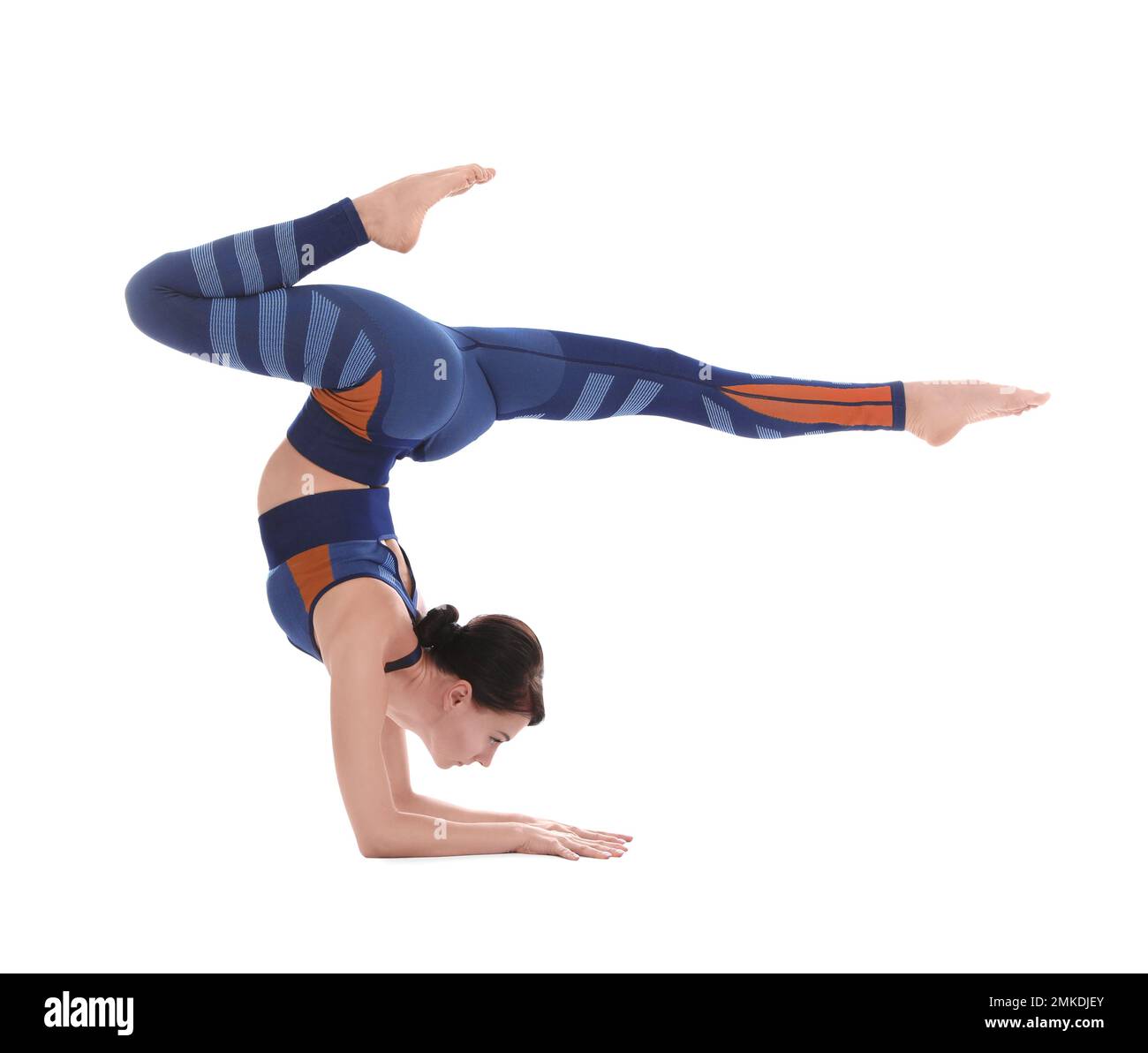 Professional young acrobat exercising on white background Stock Photo ...