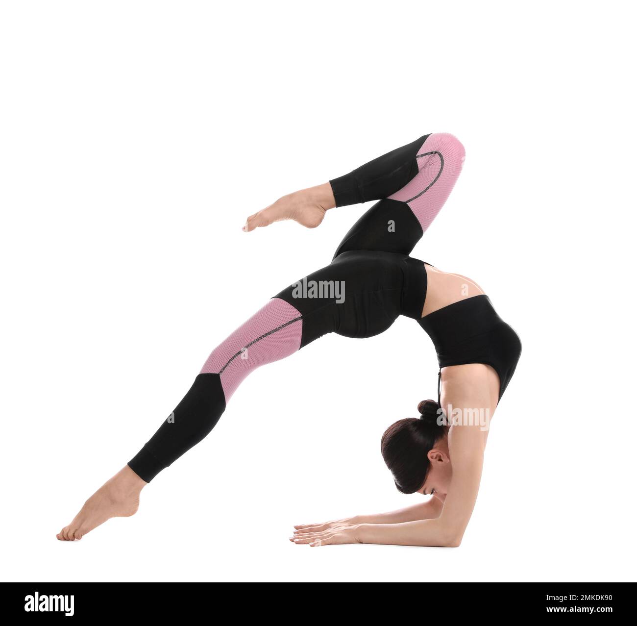 Professional young acrobat exercising on white background Stock Photo ...
