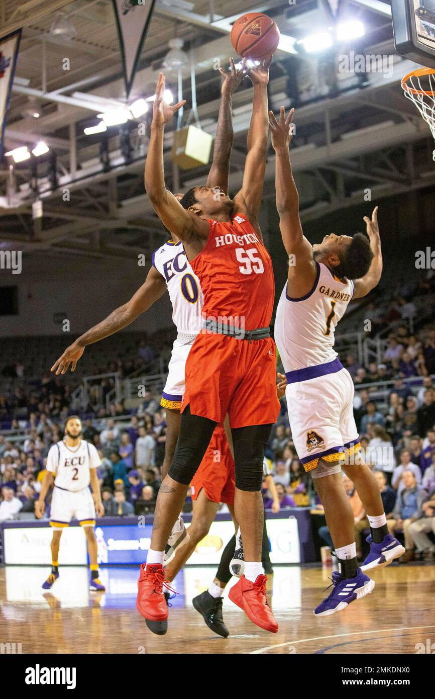 Houston's Brison Gresham (55) battles East Carolina's Isaac Fleming (0) and Jayden Gardner (1 ...