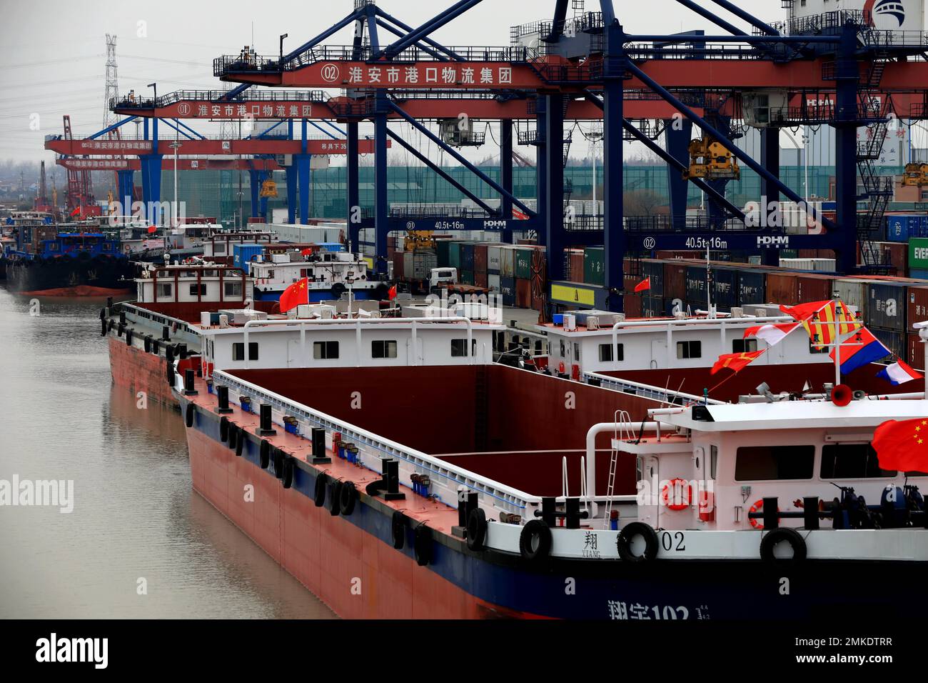 The cargo ships load and unload goods at the wharf of the Grand Canal ...