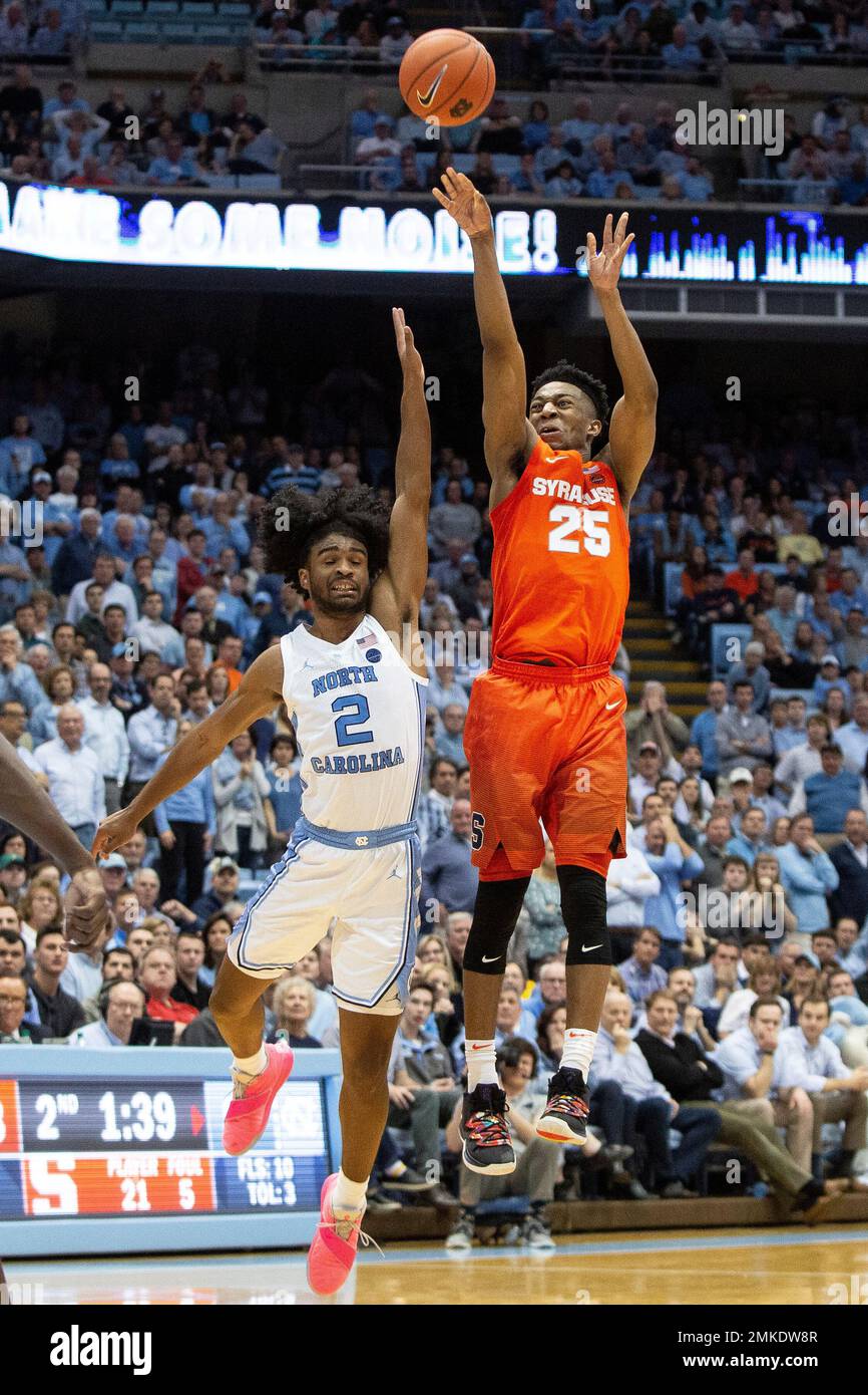 Syracuse's Tyus Battle (25) attempts a shot over North Carolina's Coby ...