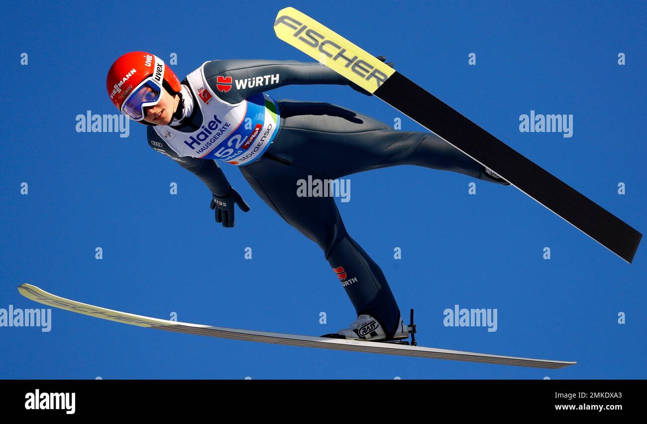 Germany's Katharina Althaus soars through the air during the women's ...