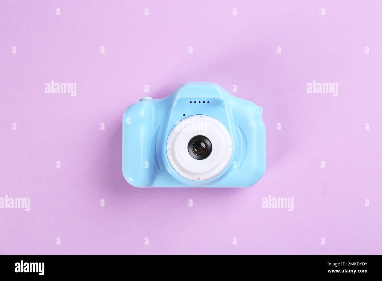 Light blue toy camera on pink background, top view Stock Photo - Alamy