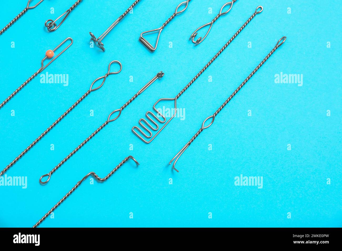 Set of logopedic probes for speech therapy on light blue background ...