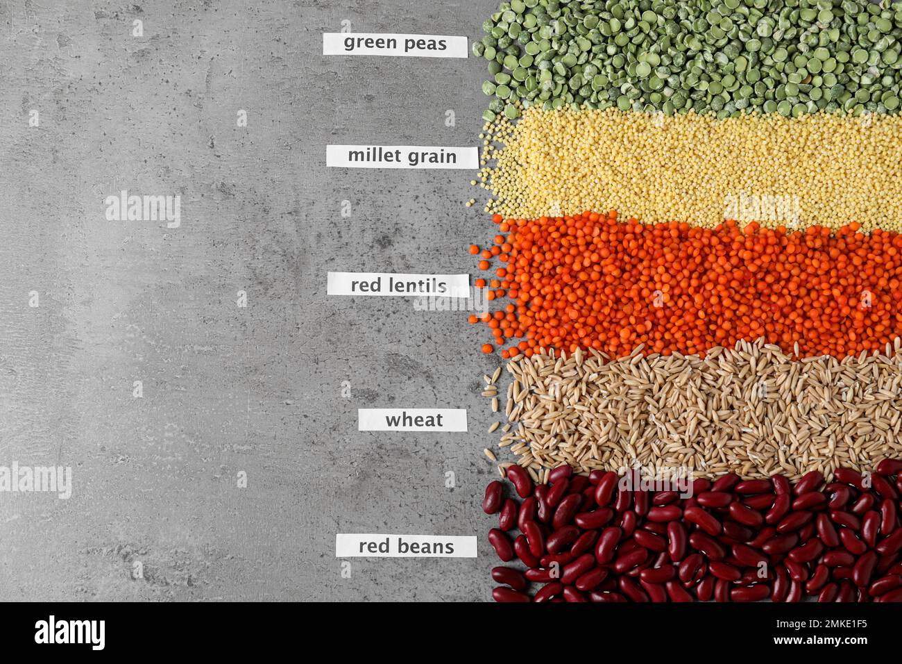 Flat lay composition with different types of legumes and cereals on ...