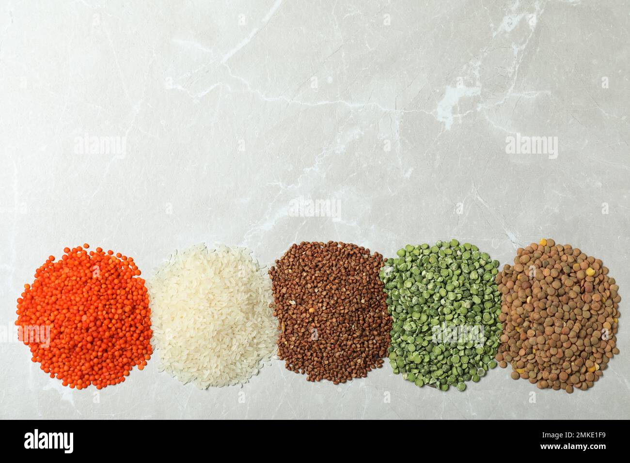 Flat lay composition with different types of legumes and cereals on ...