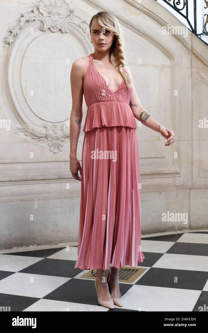 Cara Delevingne poses for photographers upon arrival at the Dior ready ...