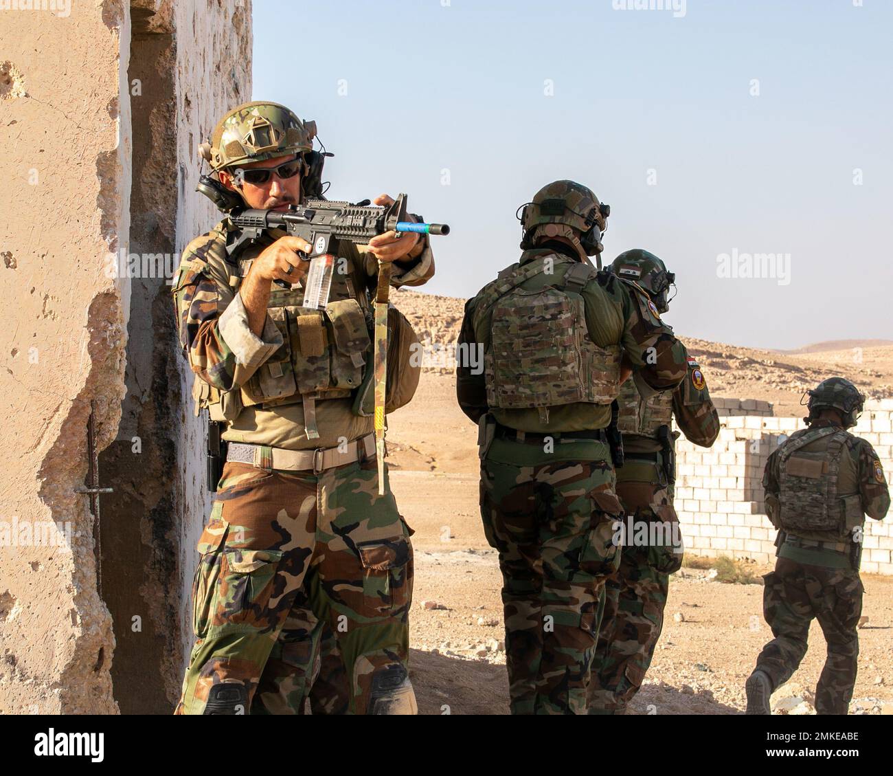 ZARQA, Jordan - An Iraqi soldier provides security while exfiltrating from a ground assault ...