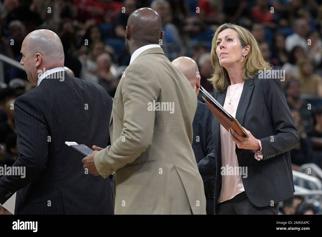 Chicago Bulls associate coach Karen Stack-Umlauf, right, huddles on the ...