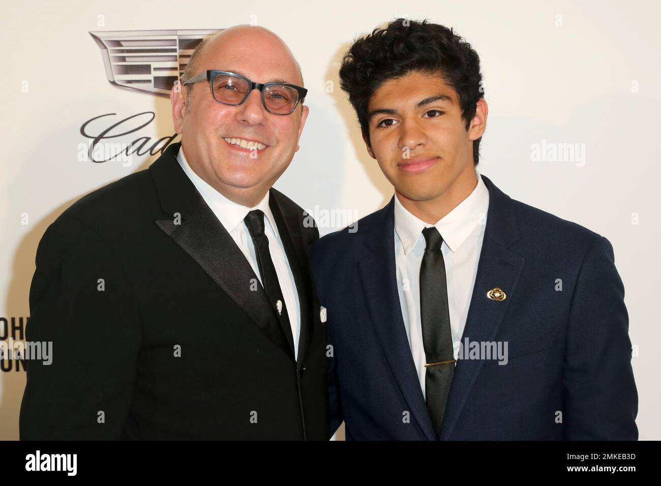 Willie Garson, left, and Nathen Garson arrive at the 2019 Elton John ...