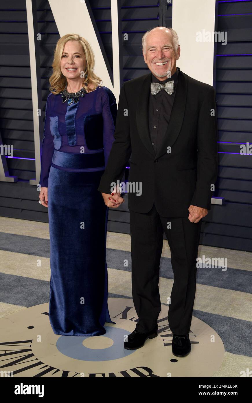 Jane Slagsvol, left, and Jimmy Buffet arrive at the Vanity Fair Oscar ...